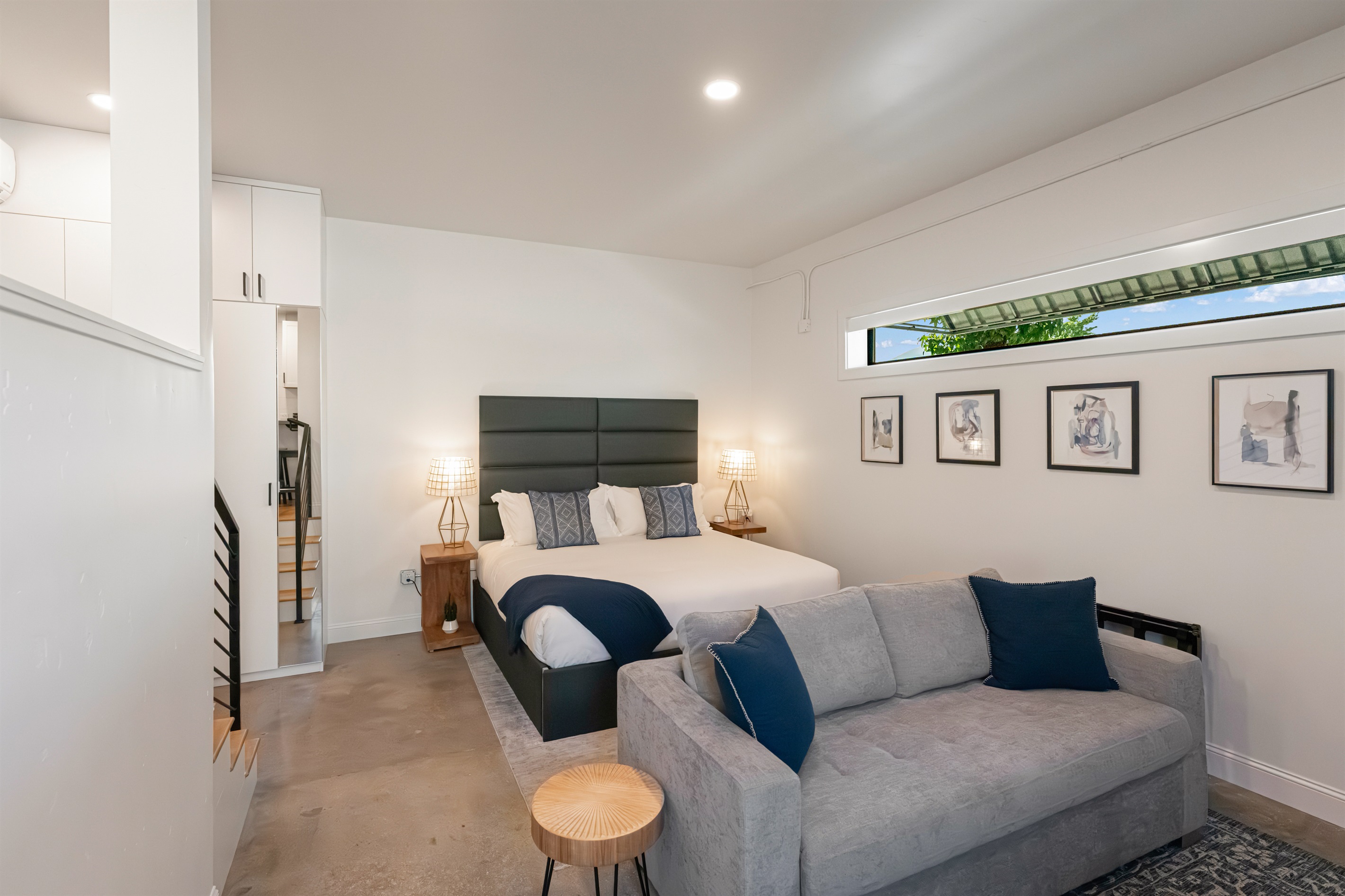 Suite 102 (1 King Bed + 1 Queen Sleeper Sofa w/ Kitchenette) - Summit Lofts